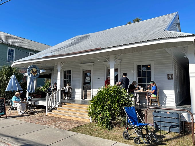 The unassuming white cottage exterior of Mockingbird Cafe beckons like a Southern grandmother promising something delicious is waiting inside.