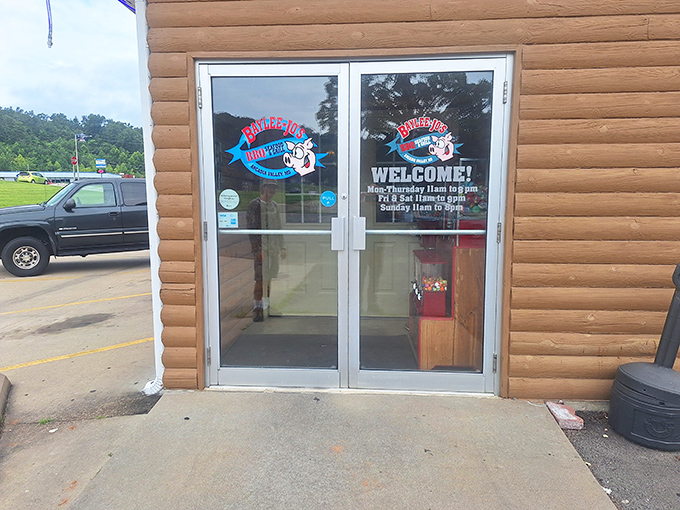 Those glass doors might as well be portals to paradise &ndash; the iconic Baylee Jo's logo promising smoky delights within those log cabin walls.