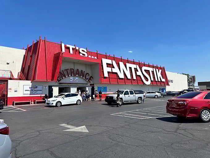The unmistakable red facade of the Fantastic Indoor Swap Meet stands like Vegas's own treasure chest, promising bargains instead of jackpots.