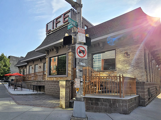 Life Pancake Company's exterior gleams in the Jersey City sunlight, its copper awnings and stone facade promising breakfast nirvana just beyond those doors.