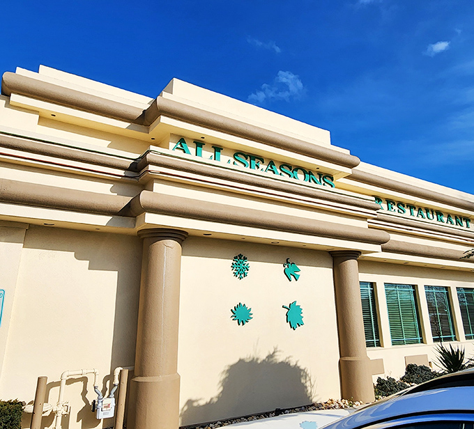 The cream-colored exterior with teal lettering stands like a culinary lighthouse on Route 35, promising comfort food salvation to hungry travelers.