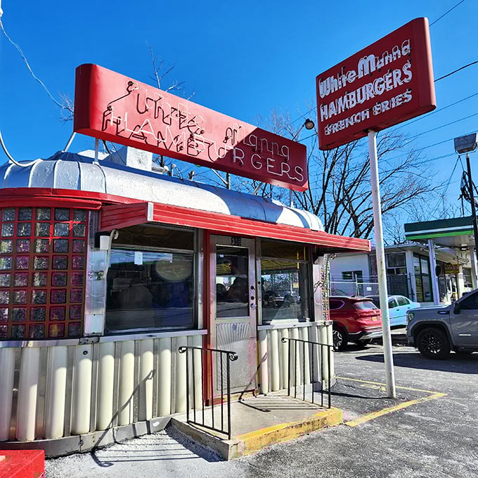 The iconic red and white exterior of White Manna stands like a time capsule on River Street, its vintage neon sign a beacon for burger pilgrims across New Jersey.