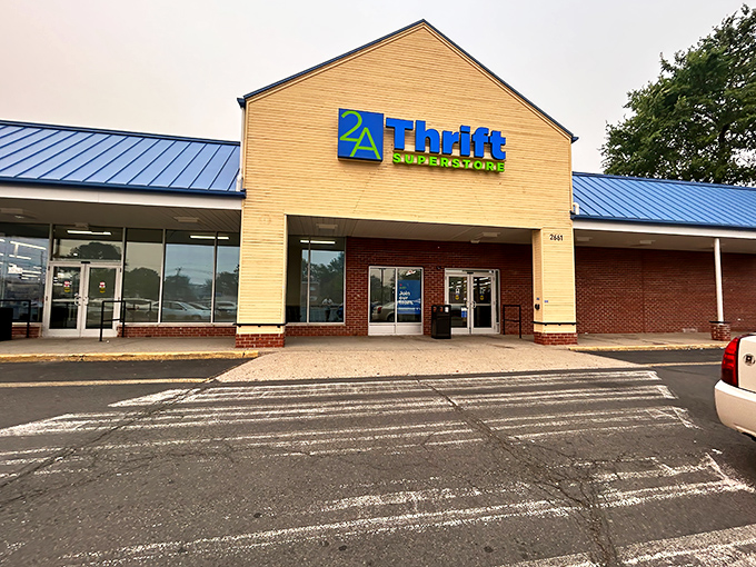 The cream-colored facade with its bright blue roof beckons like a siren song to bargain hunters everywhere.