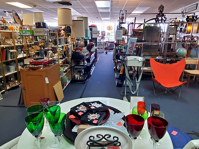 A treasure hunter's paradise where colorful glassware meets vintage furniture. Every aisle promises a new discovery waiting to be unearthed.