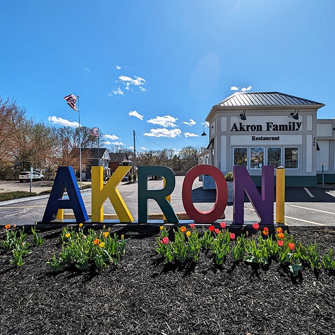 The colorful AKRON letters welcome hungry visitors like a breakfast beacon, standing proudly in front of the restaurant's clean white exterior.