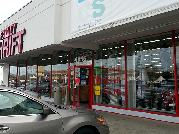 The bold red lettering of Family Thrift beckons like a siren song to bargain hunters, promising treasures behind those glass doors that would make any thrift enthusiast's heart skip a beat.