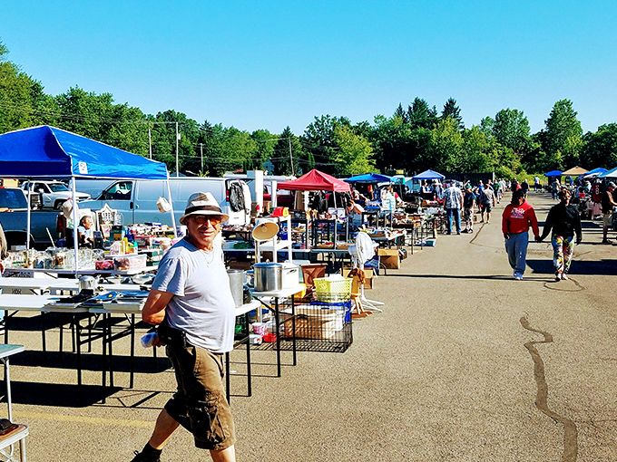 The treasure hunt begins! Rows of vendors stretch across the asphalt landscape at Four Seasons, where one person's castoffs become another's prized discoveries.