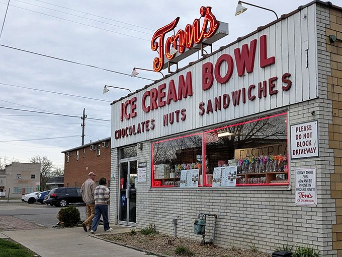 The neon sign beckons like a lighthouse for the sugar-deprived. Tom's Ice Cream Bowl stands as a testament to the enduring power of simplicity.