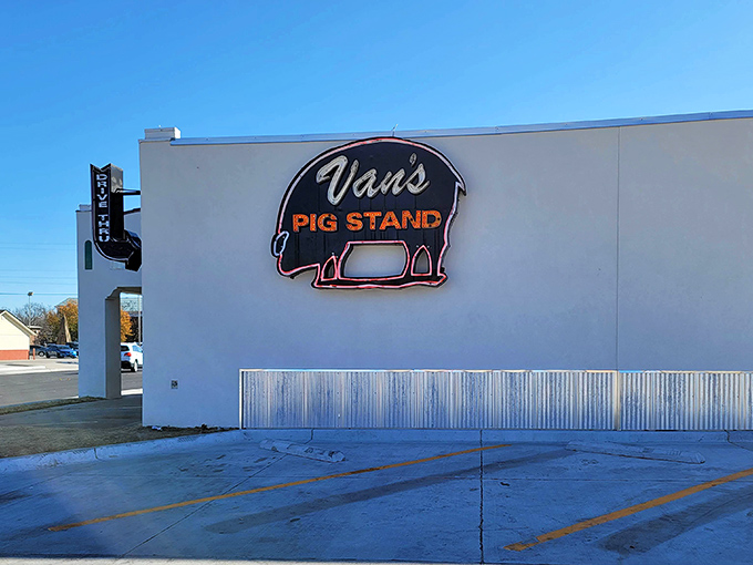 The iconic pig silhouette sign beckons hungry travelers like a barbecue lighthouse on the Oklahoma plains. Some symbols need no translation.