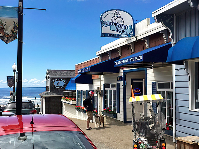 The iconic blue awnings of Chowder Bowl welcome seafood pilgrims to Newport's Nye Beach. This coastal sanctuary promises chowder salvation just steps from the Pacific.