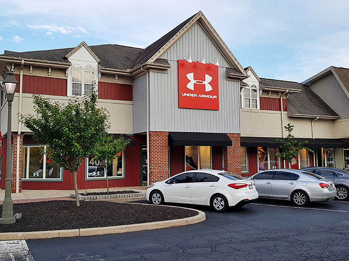The colonial-inspired architecture of Under Armour's storefront proves that even discount shopping can come with a side of historical charm.