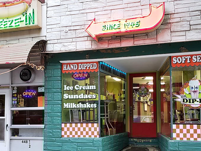 The Dip-In ice cream shop next door shares the same vintage charm. Two classic American comfort foods, side by side, creating a perfect nostalgic food corridor.