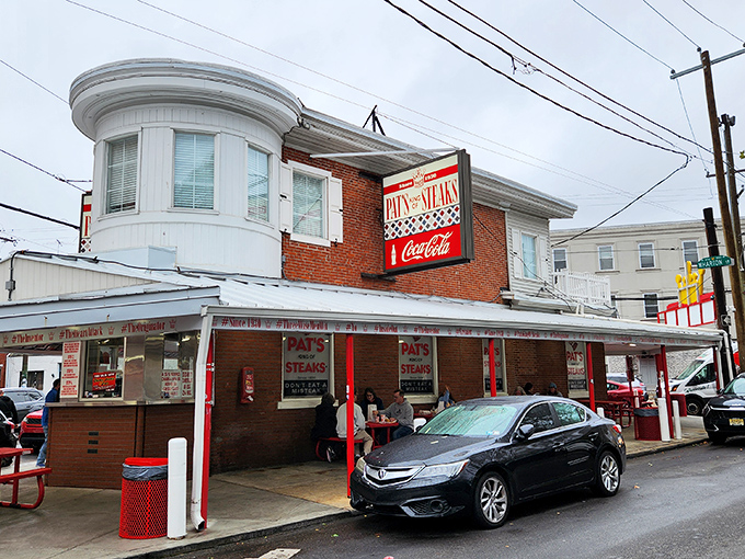The iconic crown-topped sign at Pat's King of Steaks isn't just neon braggadocio&mdash;it's a legitimate claim to Philadelphia royalty that's been earned one cheesesteak at a time.