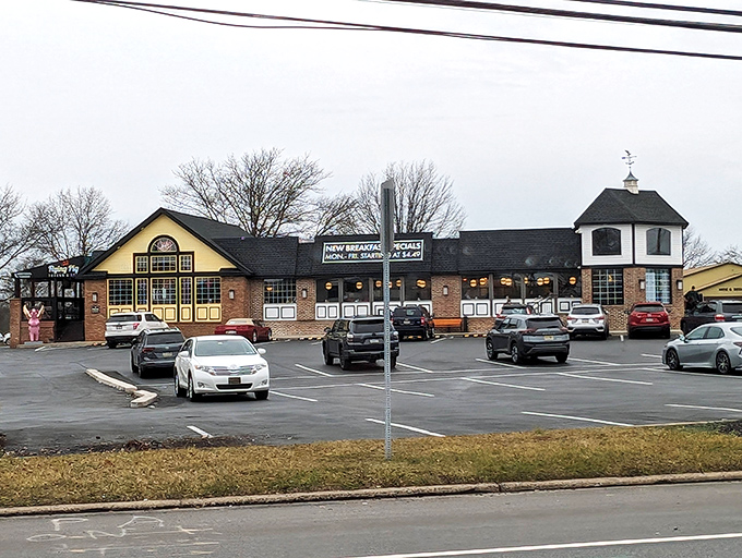 The Limerick Diner stands proudly with its distinctive yellow gable and cupola, like a beacon of comfort food calling weary travelers home.