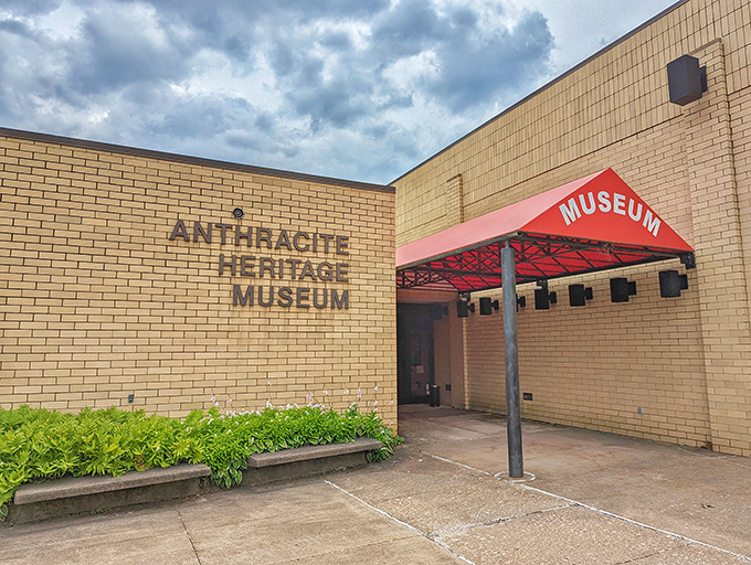 The unassuming tan brick exterior belies the treasure trove of industrial history waiting inside. Coal may be dark, but the stories here shine bright.