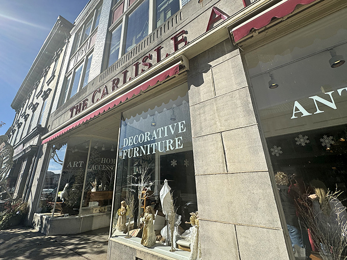 The red awning and classic exterior of The Carlisle make it feel like a hug from the past, touched with just the right bit of modern charm.