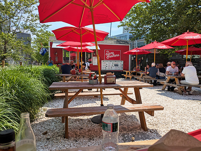 The picnic tables scattered across gravel might be simple, but the seafood served here is absolutely extraordinary in every way.