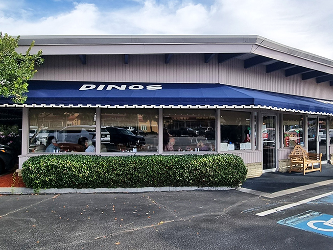 The blue awning beckons like a breakfast lighthouse on the North Myrtle Beach horizon. Dino's unpretentious exterior promises pancake paradise within.