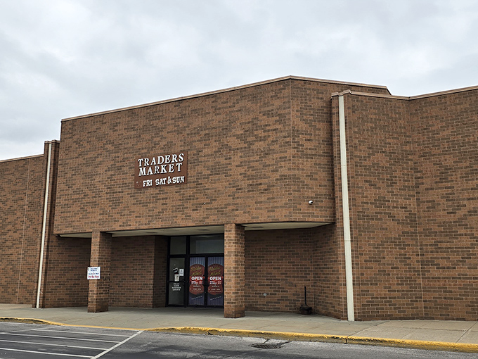 The unassuming brick exterior of Traders Market hides a wonderland of treasures within, like a retail TARDIS waiting to be explored.