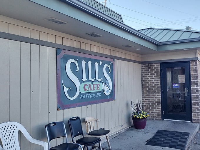 The unassuming facade of Sill's Cafe stands like a culinary lighthouse in Layton, beckoning hungry travelers with its vintage sign and no-nonsense charm.