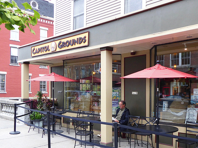 The perfect Vermont morning starts here: Capitol Grounds' inviting storefront with those signature red umbrellas beckoning you like an old friend on State Street.