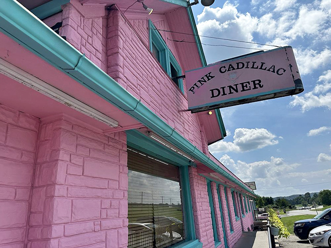 That classic diner sign against a blue Virginia sky promises the kind of authentic roadside experience that chain restaurants can only dream of replicating.
