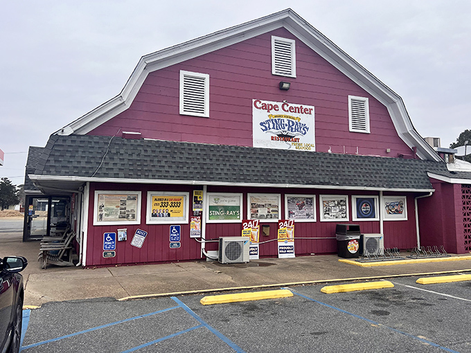 The iconic burgundy barn-like structure of Sting-Ray's stands proudly along Route 13, a beacon for hungry travelers and seafood enthusiasts alike.