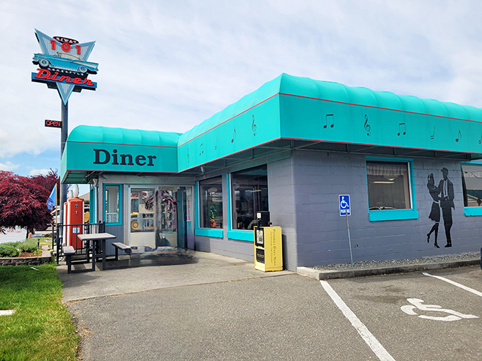 The turquoise crown jewel of Sequim's dining scene stands proudly against the Washington sky, promising comfort food that'll make your cardiologist wince and your soul sing.