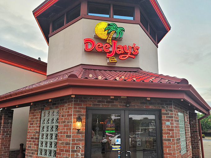 Rain-slicked parking lots never looked so inviting. That glowing BBQ RIBS sign promises shelter from the storm and salvation for your taste buds.