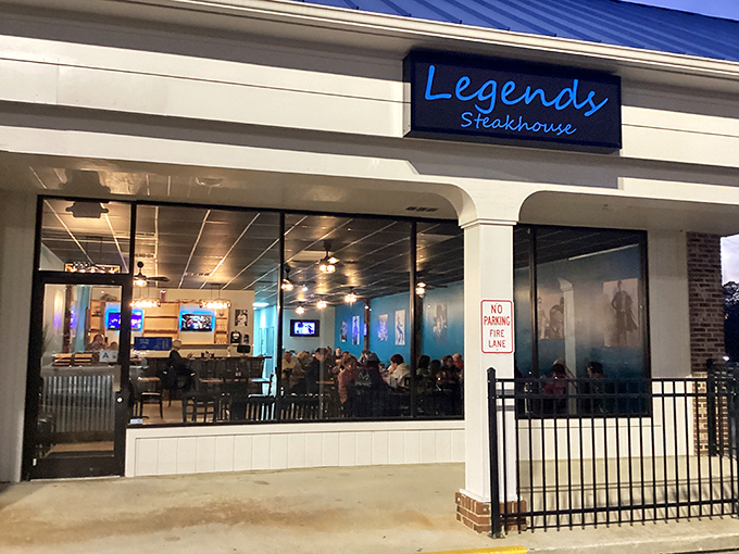 The glowing blue sign beckons hungry travelers like a lighthouse for steak lovers. Inside those windows, ribeye dreams come true in downtown Newberry.