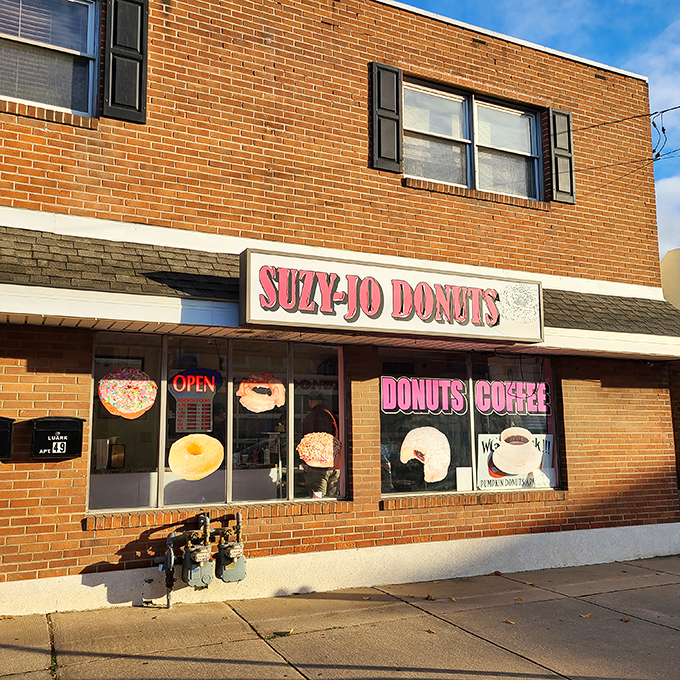 The pink neon promise of Suzy-Jo Donuts beckons from this unassuming Bridgeport storefront &ndash; proof that treasure doesn't always hide in fancy packaging.