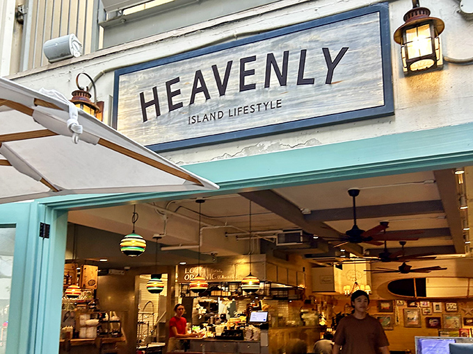 The entrance to paradise isn't pearly gates, but this wooden sign flanked by lanterns that whisper, "Come in, relax, eat something wonderful."