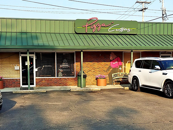 Pizza Crossing's unassuming exterior hides culinary treasures within. The green-roofed building in Logan has become a pilgrimage site for pizza aficionados throughout Ohio.