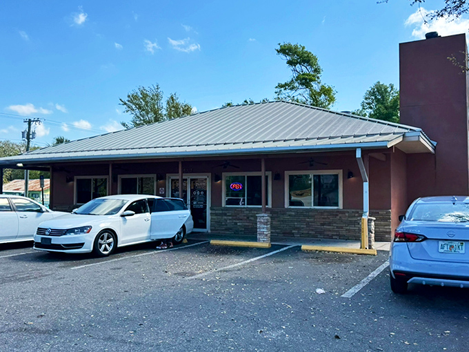 The unassuming exterior of Big John's Alabama BBQ proves once again that the best barbecue joints often hide in plain sight, waiting to reward the curious.