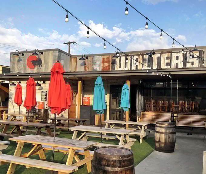 The outdoor paradise at Walter's BBQ, where picnic tables, colorful umbrellas, and string lights create the perfect setting for a brisket-fueled afternoon of pure joy.