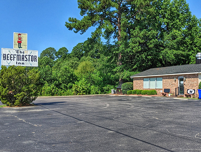 The unassuming exterior of The Beefmastor Inn proves once again that the best steakhouses often hide in plain sight, like culinary speakeasies for carnivores.