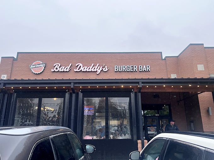 The unassuming brick exterior of Bad Daddy's hides a burger paradise within. Like finding a treasure map in your attic, this place promises delicious adventures.