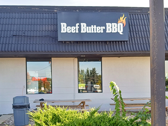 The blue corrugated roof and flame-adorned sign are like a beacon for barbecue pilgrims. Simple exterior, extraordinary flavors await inside.
