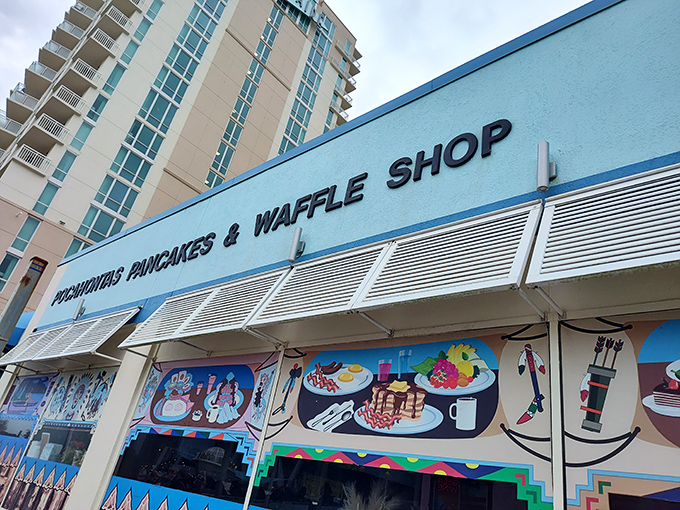 The iconic turquoise exterior of Pocahontas Pancake House beckons hungry visitors just steps from Virginia Beach's oceanfront.