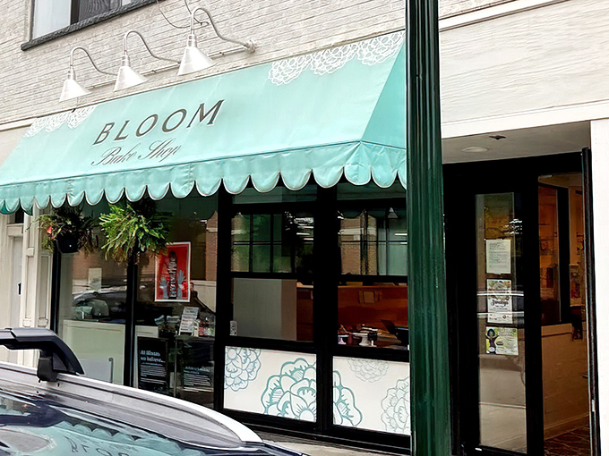 That mint-green awning isn't just charming&mdash;it's nature's way of signaling "extraordinary pastries ahead," like peacocks flashing their feathers.