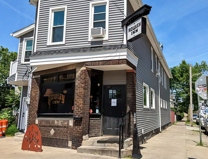 The unassuming exterior of Rowley Inn stands like a culinary speakeasy in Cleveland's Tremont neighborhood—proof that the best treasures often hide in plain sight.