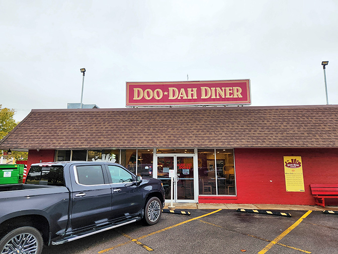 That bold red exterior and vintage sign aren't just calling your name &ndash; they're singing it in perfect diner harmony.