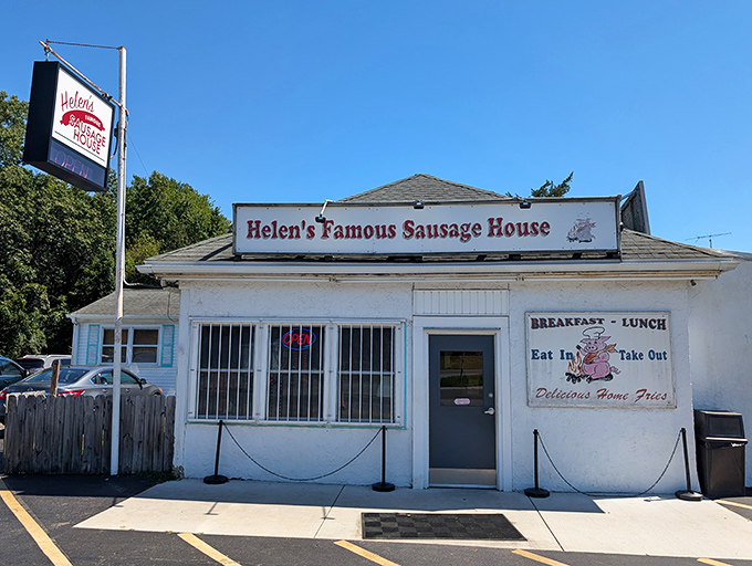 The unassuming white exterior of Helen's Sausage House stands like a breakfast beacon along Route 13, promising delicious treasures within for those wise enough to stop.