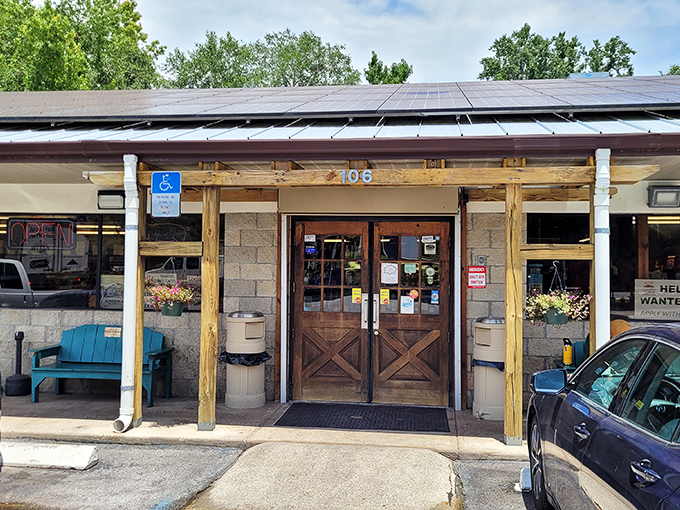 The unassuming entrance to culinary paradise. Those wooden crosshatch doors have welcomed hungry travelers for years, proving Florida's best flavors often hide in plain sight.