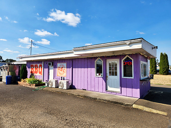 Simplicity reigns supreme at this unassuming BBQ joint. The vibrant purple exterior promises bold flavors inside &ndash; a promise it definitely keeps.