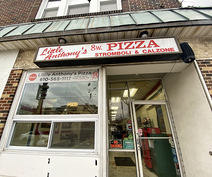 The unassuming storefront of Little Anthony's in Media&mdash;proof that pizza paradise doesn't need neon lights or fancy facades to work its magic.
