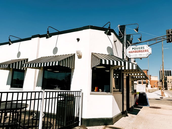 That iconic white building with striped awnings isn't just a restaurant—it's a Fort Wayne landmark where burger dreams come true.