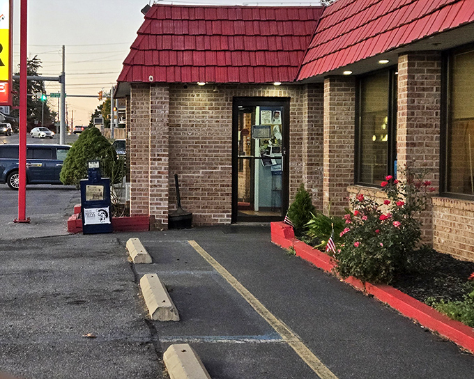 Brick, red trim, and a welcoming entrance &ndash; this unassuming diner holds culinary treasures waiting to be discovered.