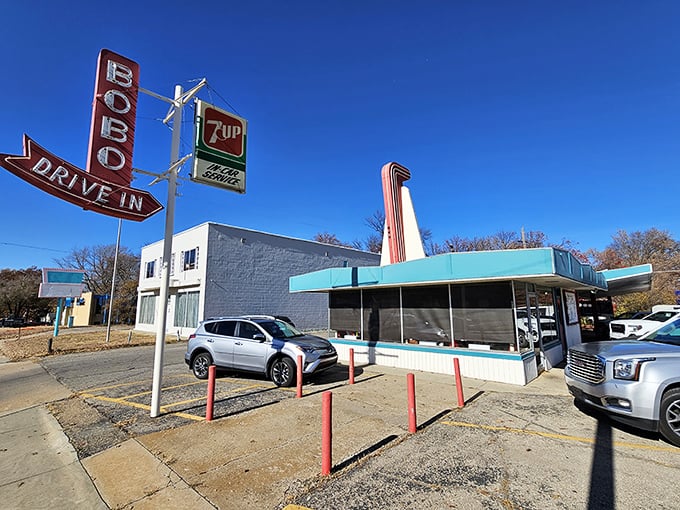 The iconic red Bobo's sign stands tall against the Kansas sky, a beacon of burger perfection that's been drawing hungry pilgrims for generations.