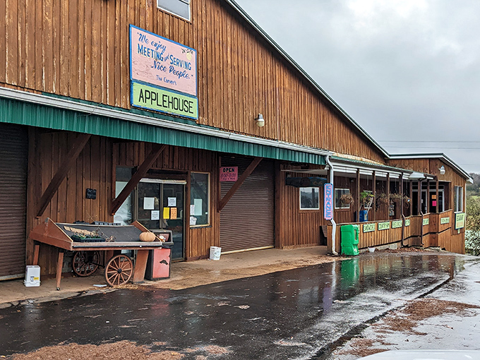The rustic wooden exterior of Carver's Applehouse welcomes visitors with its charming simplicity and promise of Southern comfort food inside.
